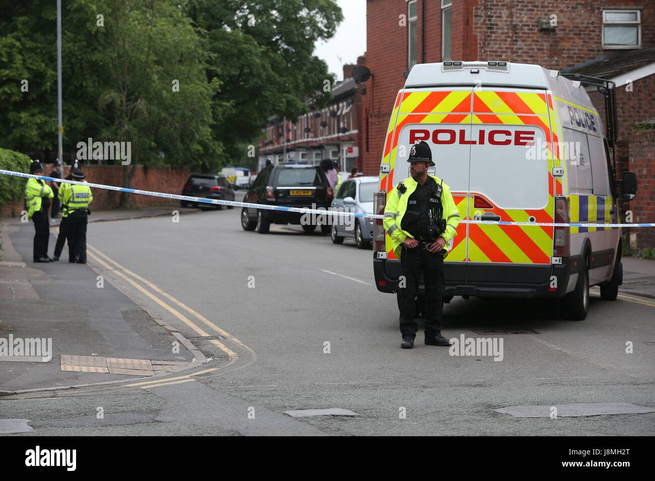 A police cordon at the top of Oxney Road, Rusholme, where Greater ...