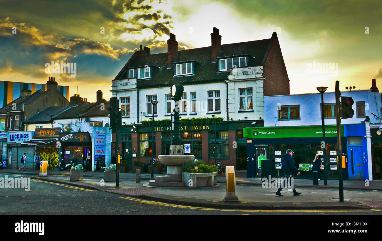 Parade of shops and the Forest Tavern pub at the junction of Woodgrange ...