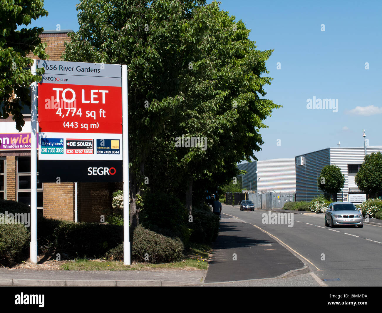 Estate agents industrial warehouse and office units to let sign Stock ...