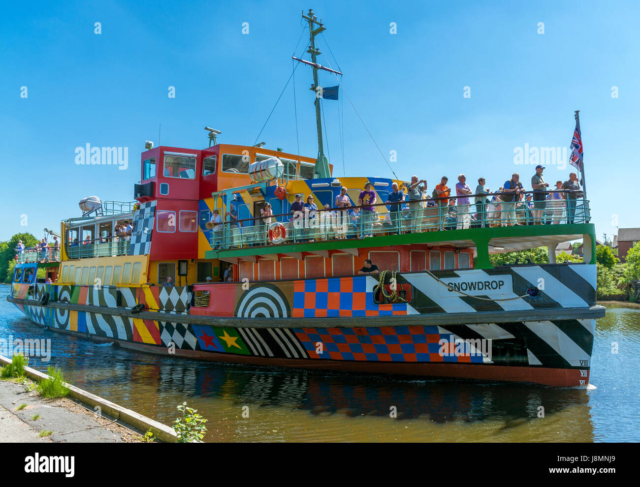 A view of the pleasure cruiser 'Snowdrop' sailing along the Manchester ...