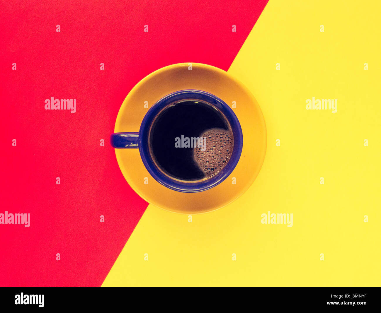 Blue cup of coffee on a colorful pastel background Stock Photo - Alamy