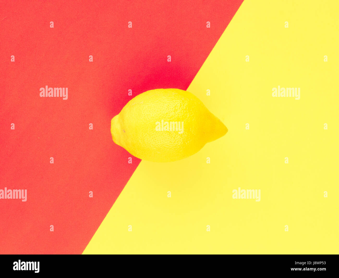 Single lemon on a colorful pastel background Stock Photo - Alamy