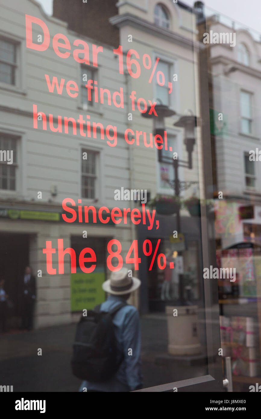 Windsor, UK. A screen and inside the window of a Lush store is used to ...