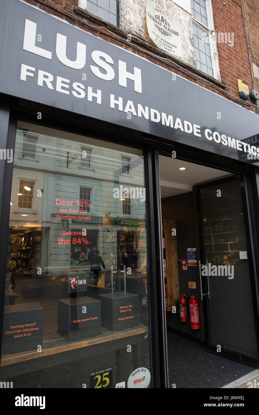 Windsor, UK. A screen and props inside the window of a Lush store are ...