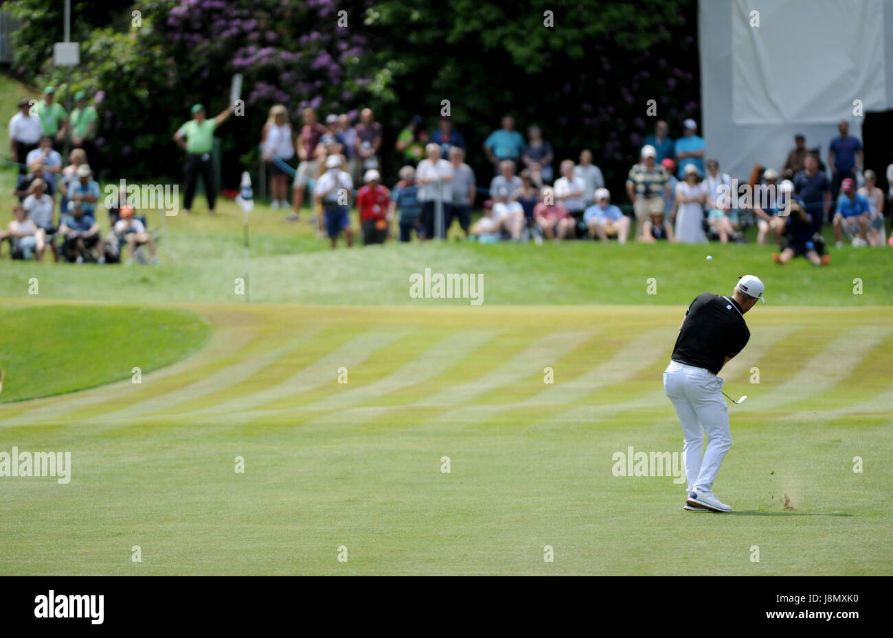 Virginia Water, Surrey, UK. 28th May, 2017. Andrew Dodt (AUS) holes his ...