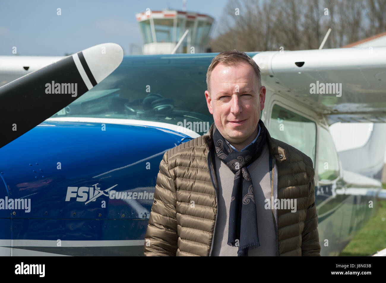Aerial observer Michael Muenchow poses in front of a Cessna 172 during ...