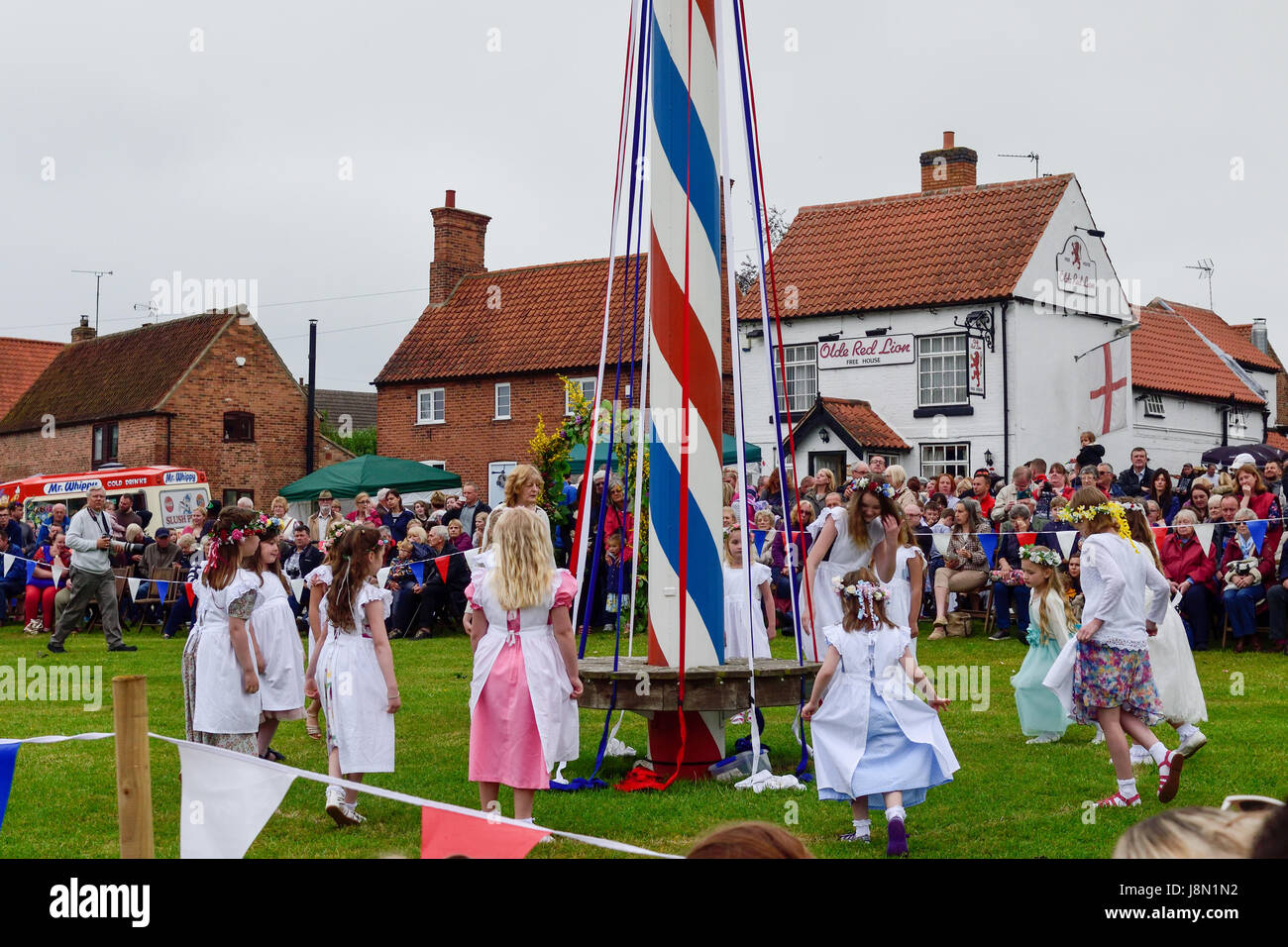 Village green fete maypole hi-res stock photography and images - Alamy