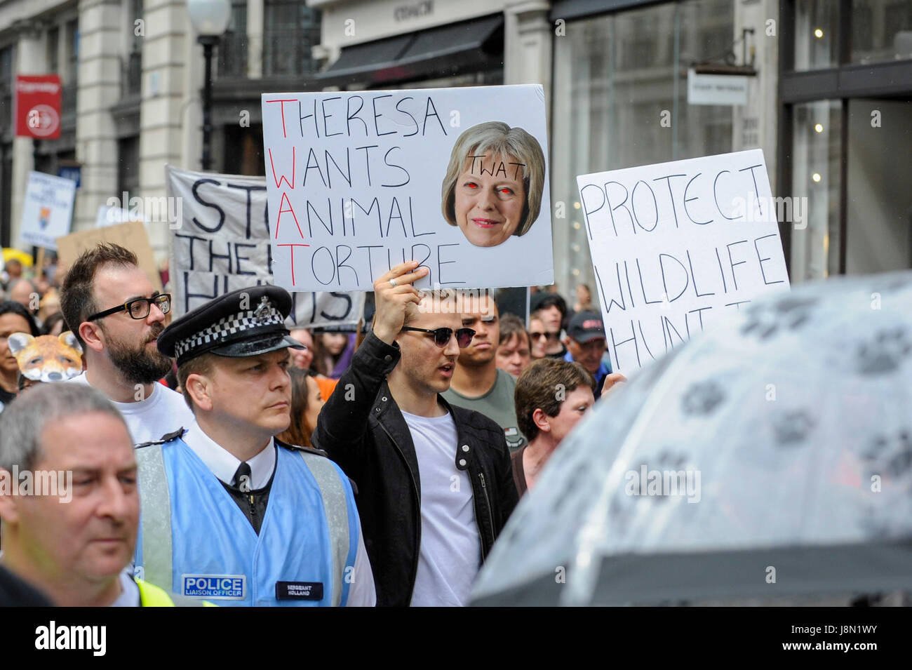 London, UK. 29th May, 2017. Demonstrators carrying signs stage an "Anti ...