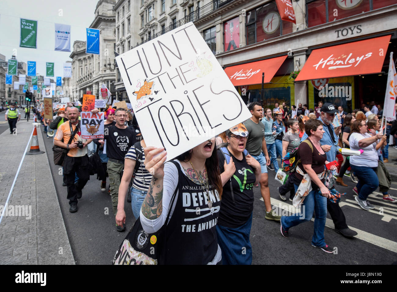 London, UK. 29th May, 2017. Demonstrators carrying signs stage an "Anti ...