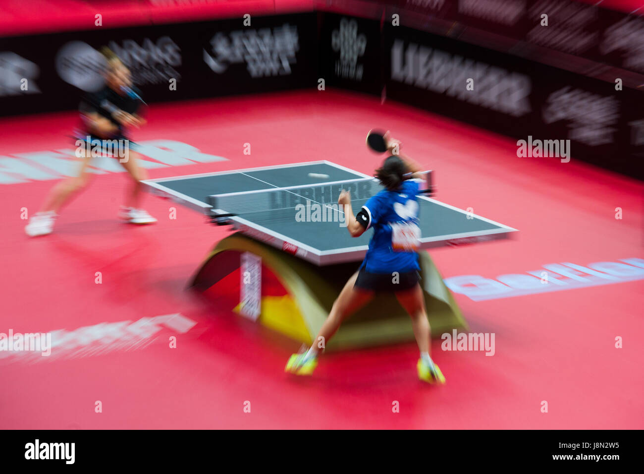 Women playing in the qualifiers at the Table Tennis World Championships ...
