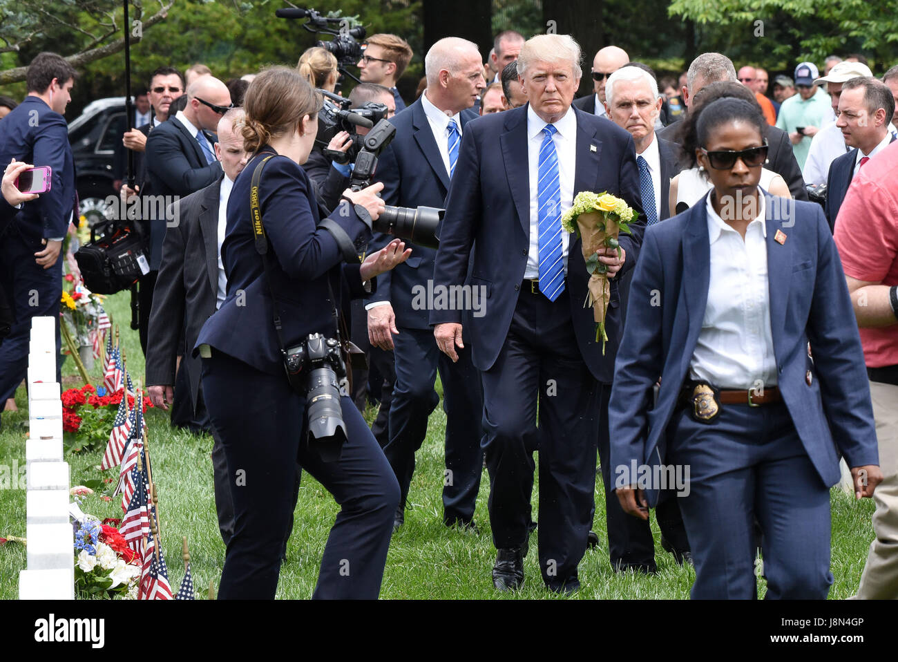 United States President Donald J. Trump walks through Section 60 after ...