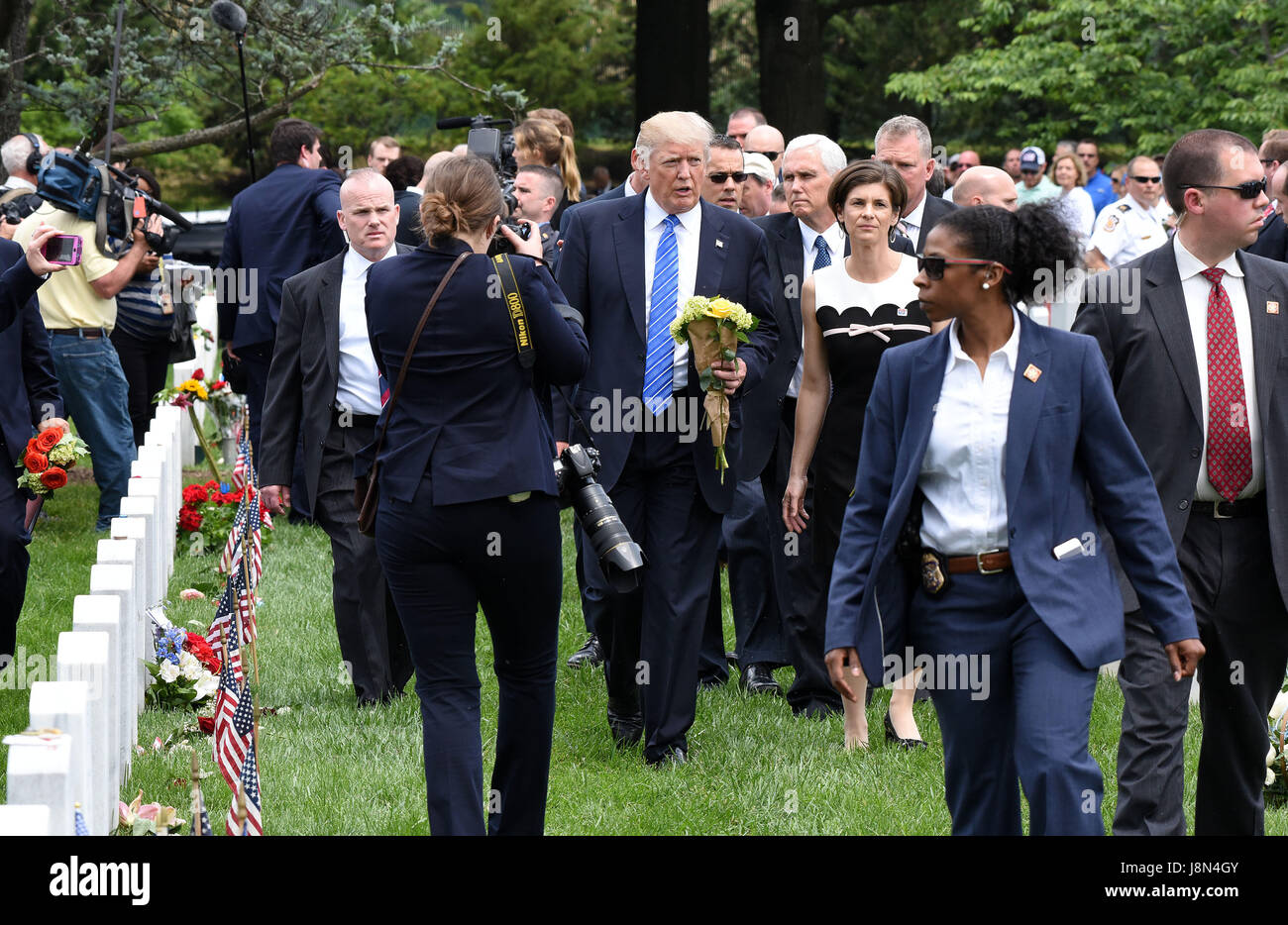 United States President Donald J. Trump walks through Section 60 after ...