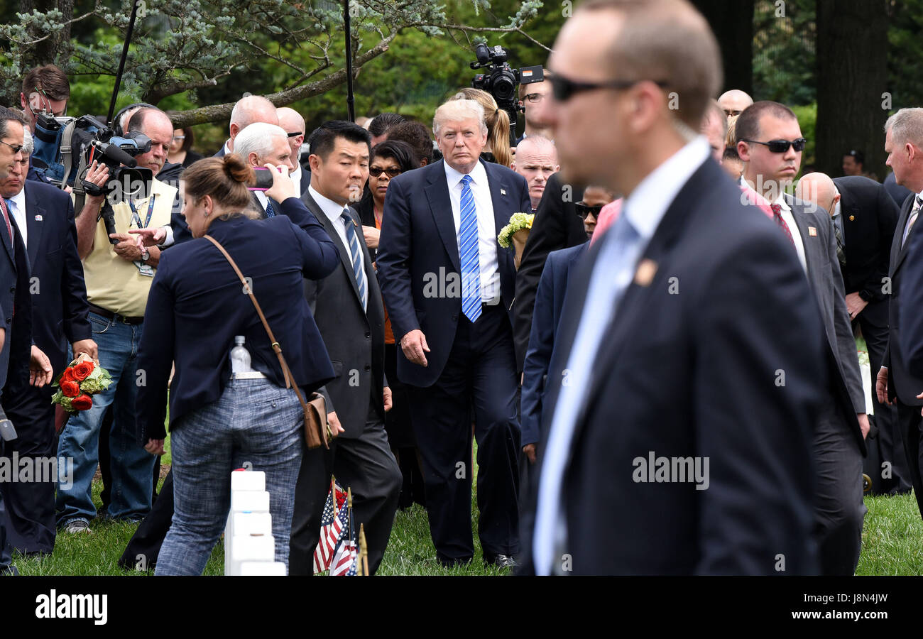 United States President Donald J. Trump walks through Section 60 after ...