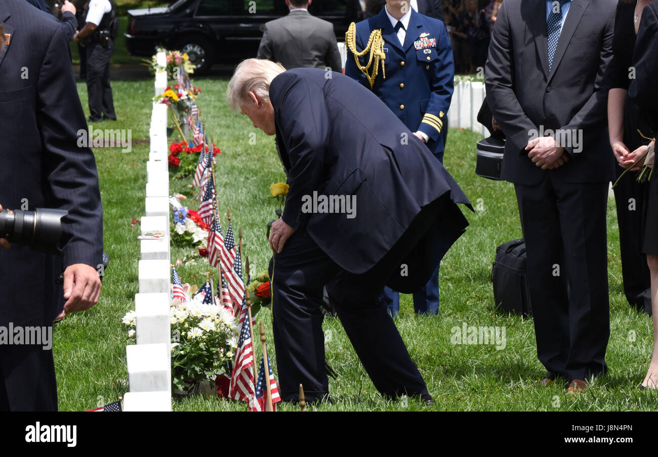 United States President Donald J. Trump walks through Section 60 after ...