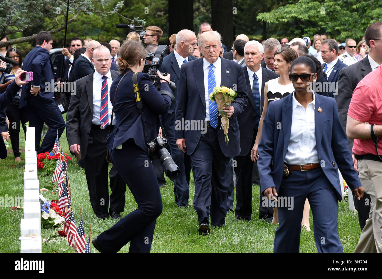 United States President Donald J. Trump walks through Section 60 after ...