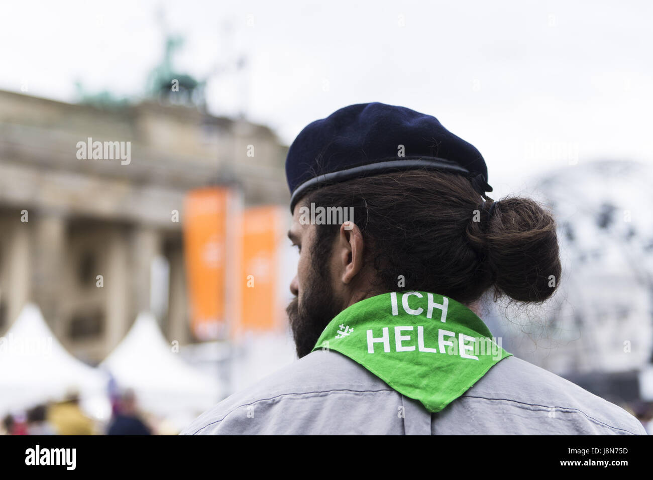 Berlin, Berlin, Germany. 24th May, 2017. A Scout wears a cloth with the ...