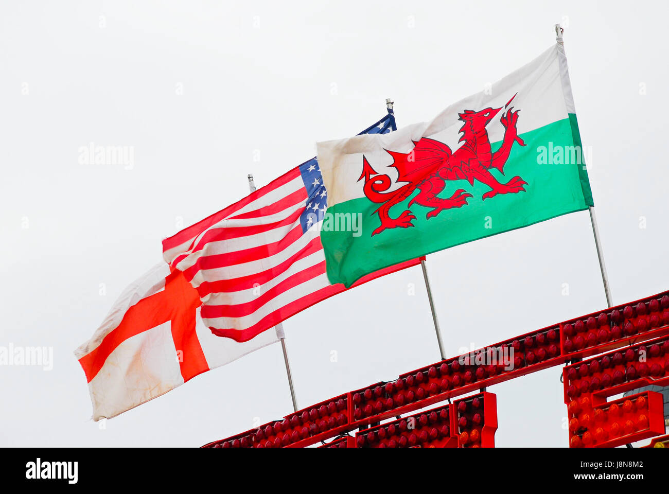 Dorset, UK. 30th May, 2017. Flags of England, America and Wales flutter ...