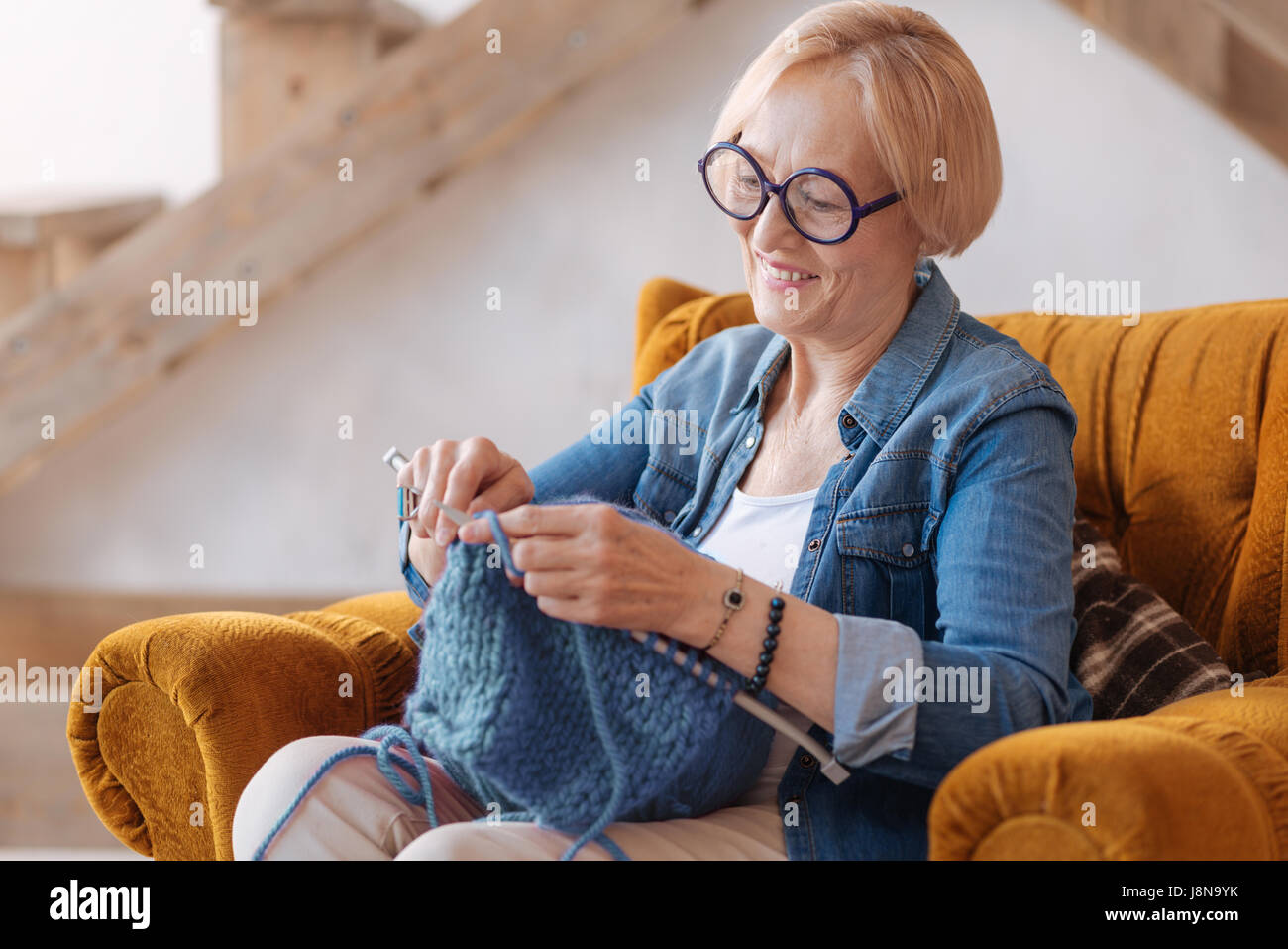 Love my hobby. Positive delighted female person being very glad while ...