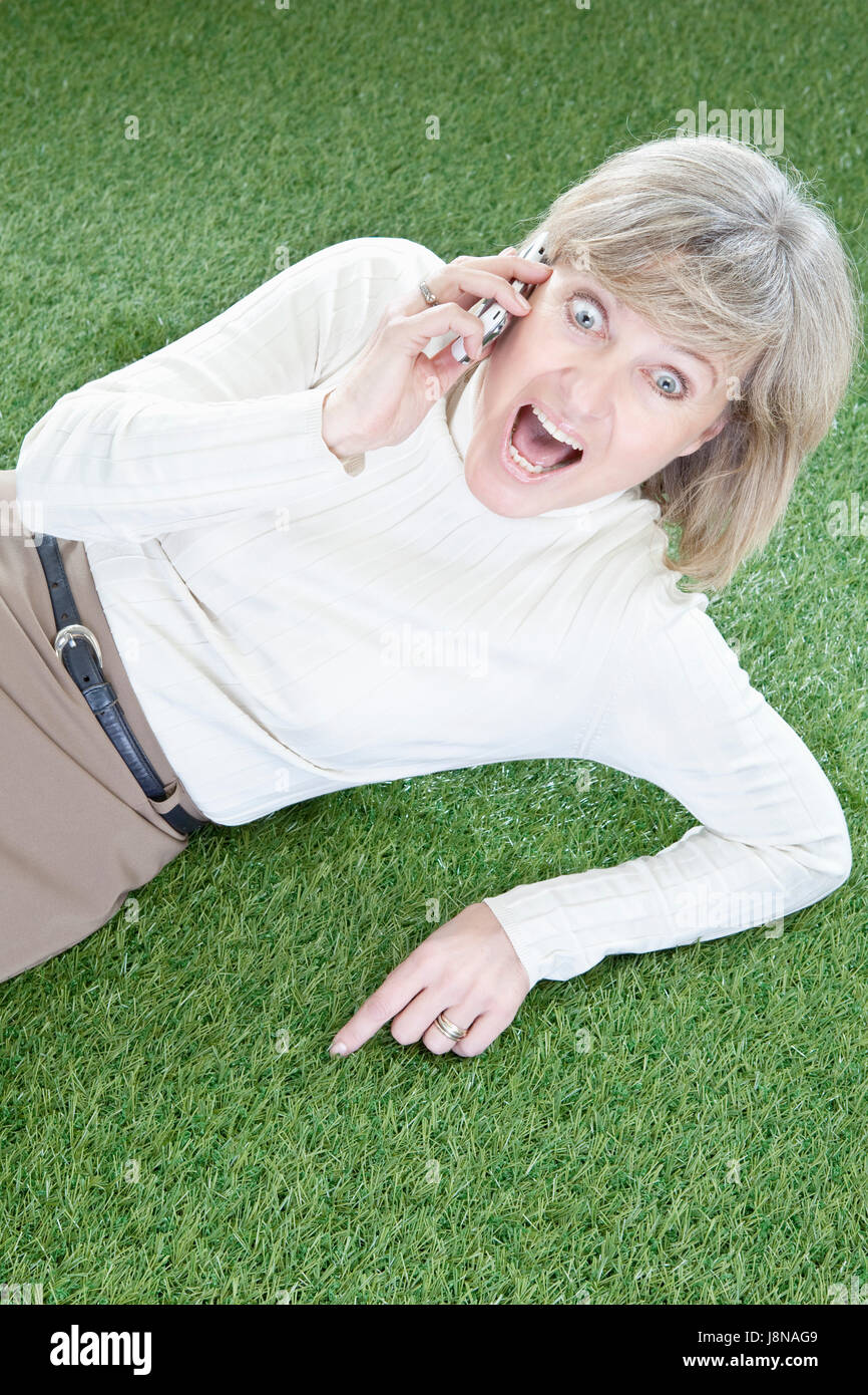 Camera phone lies in grass hi-res stock photography and images - Alamy