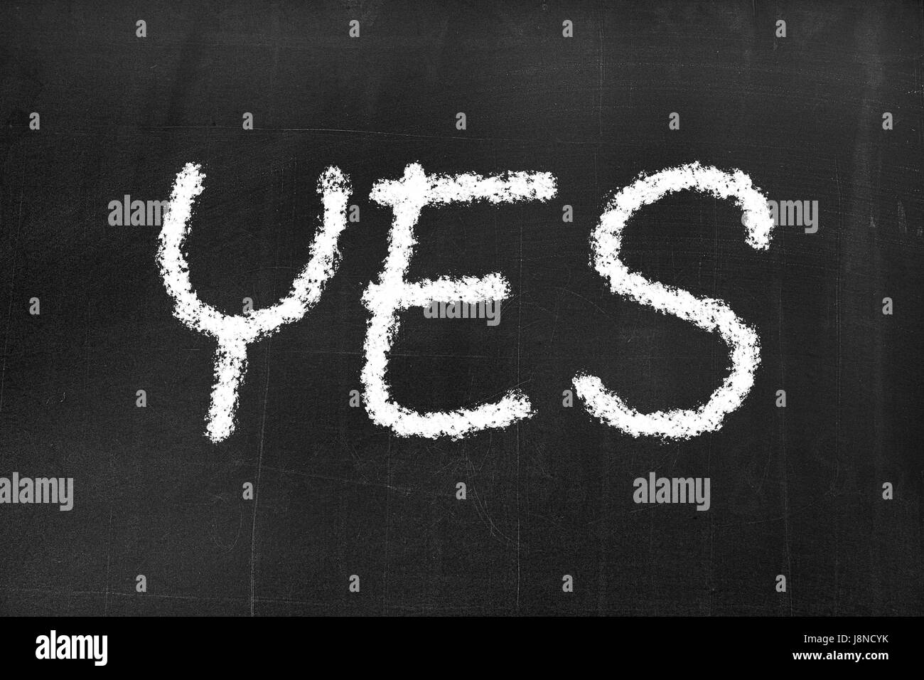 Blackboard with the text 'yes' background texture Stock Photo - Alamy