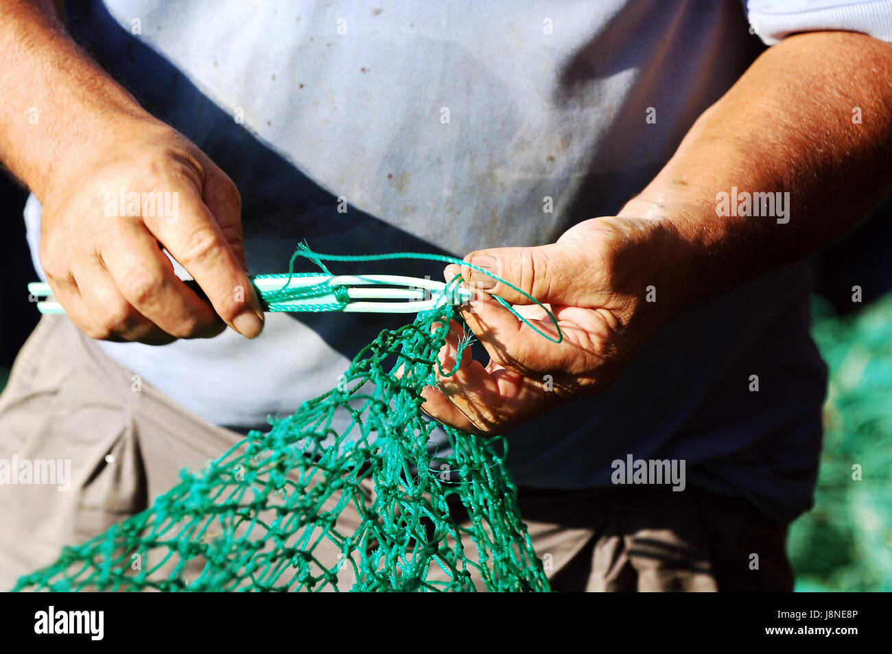 Fishing net weaving hi-res stock photography and images - Alamy