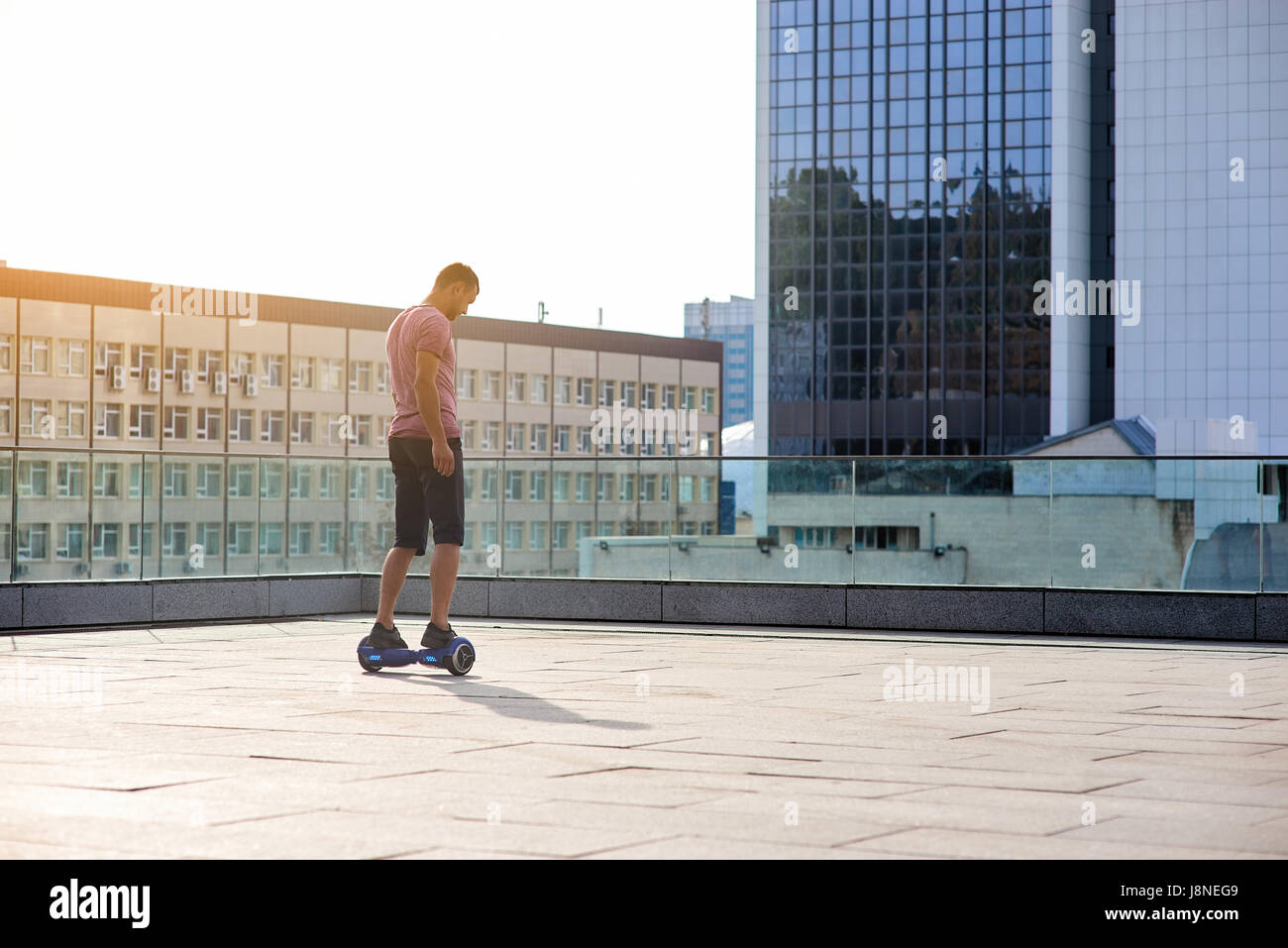 Man riding hoverboard Stock Photo - Alamy