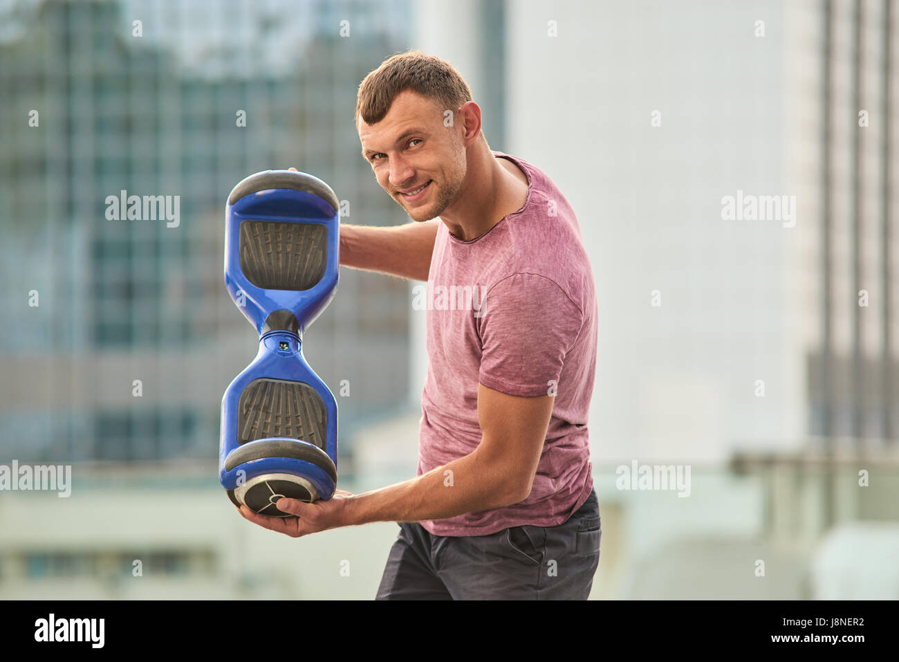 Man holding gyroboard Stock Photo - Alamy