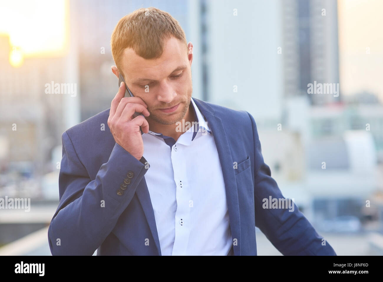 Young businessman on the phone Stock Photo - Alamy