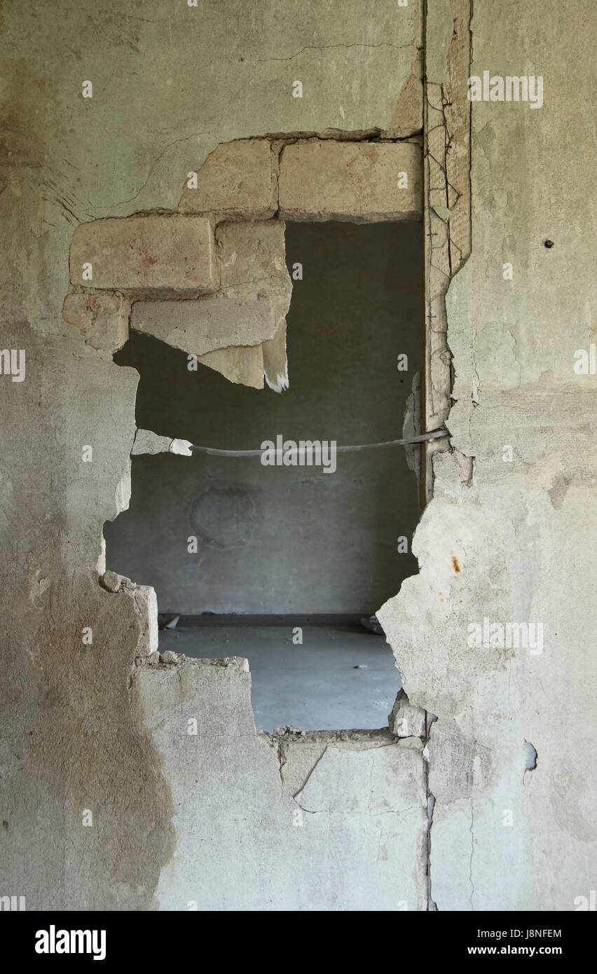 Brick through plaster hi-res stock photography and images - Alamy