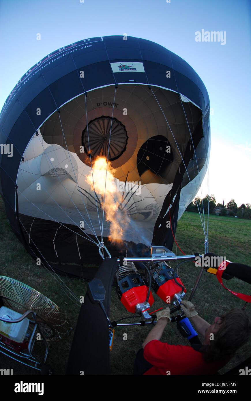 Inflating hot air balloon: Detail of fire burners Stock Photo - Alamy