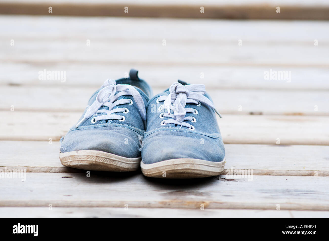 pair of old shoes on a dock Stock Photo - Alamy