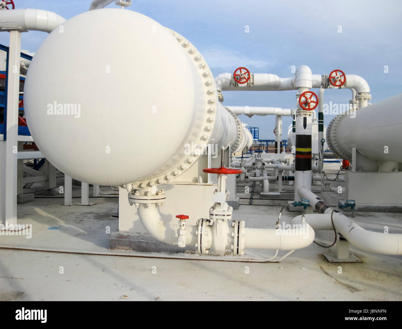 Heat exchangers in a refinery. The equipment for oil refining Stock ...