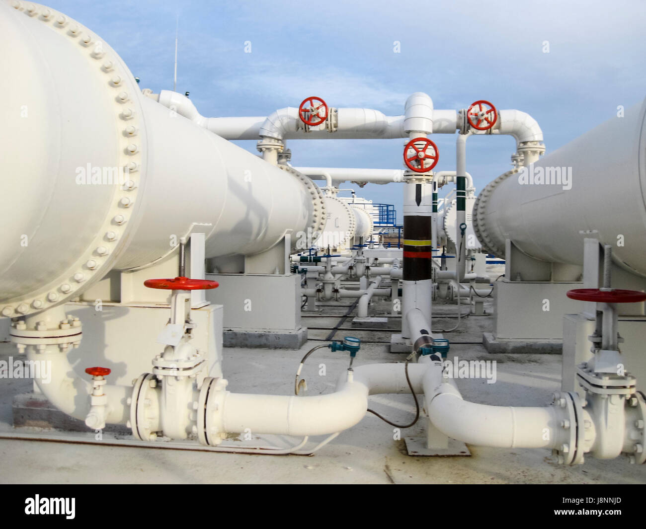 Heat exchangers in a refinery. The equipment for oil refining Stock ...