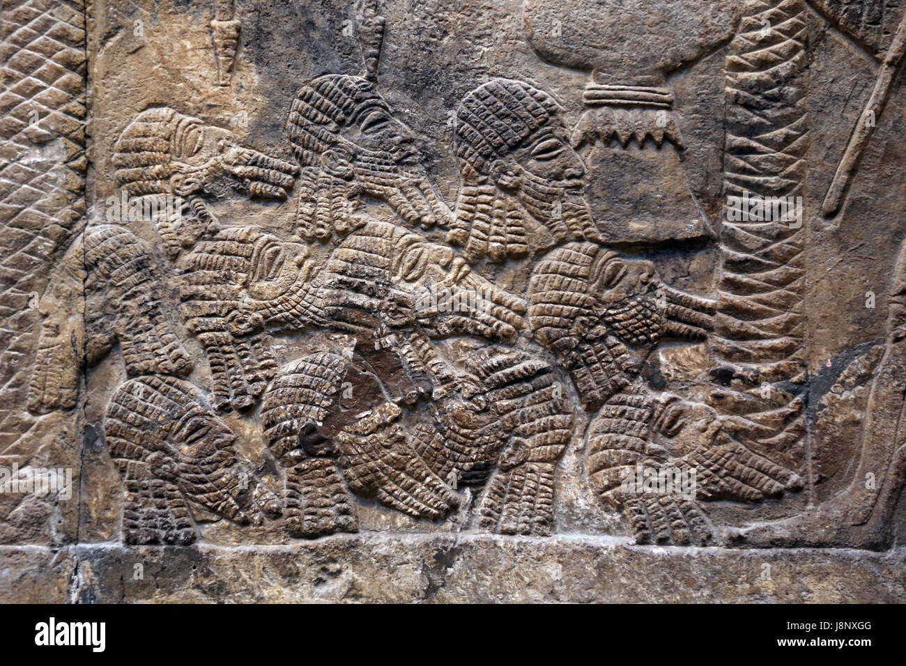 Campaigning in southern Iraq. Decapitated heads. Assyrian, 640-620 BC ...