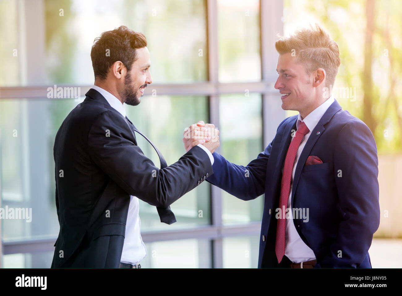 Standing smiling communication greeting hi-res stock photography and ...