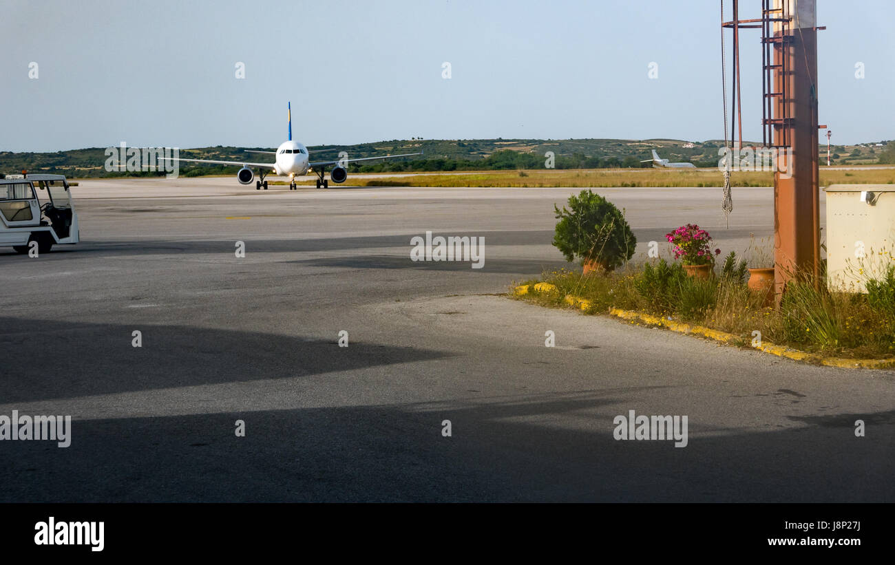 Front view of plane stay in small airport Stock Photo - Alamy