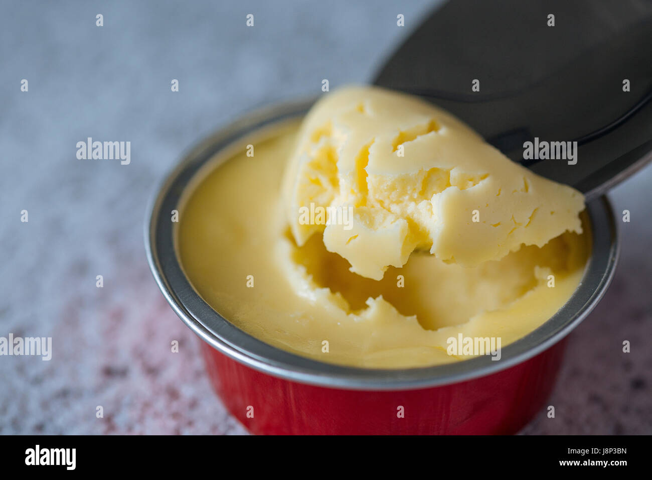 A Small Cup of Cheese Stock Photo - Alamy