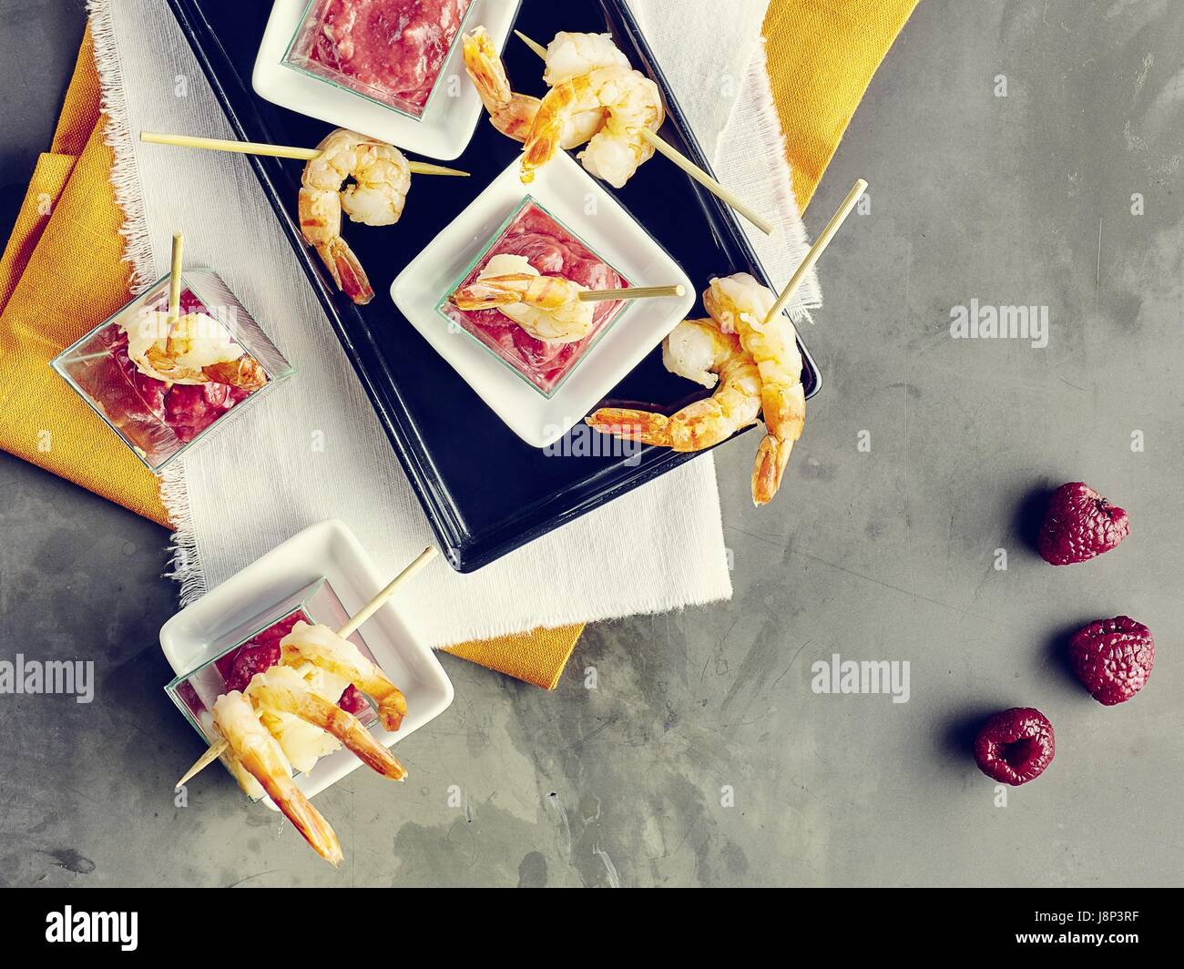 Raspberry - wasabi - dip with shrimps Stock Photo - Alamy