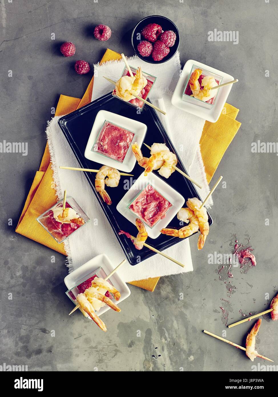 Raspberry - wasabi - dip with shrimps Stock Photo - Alamy