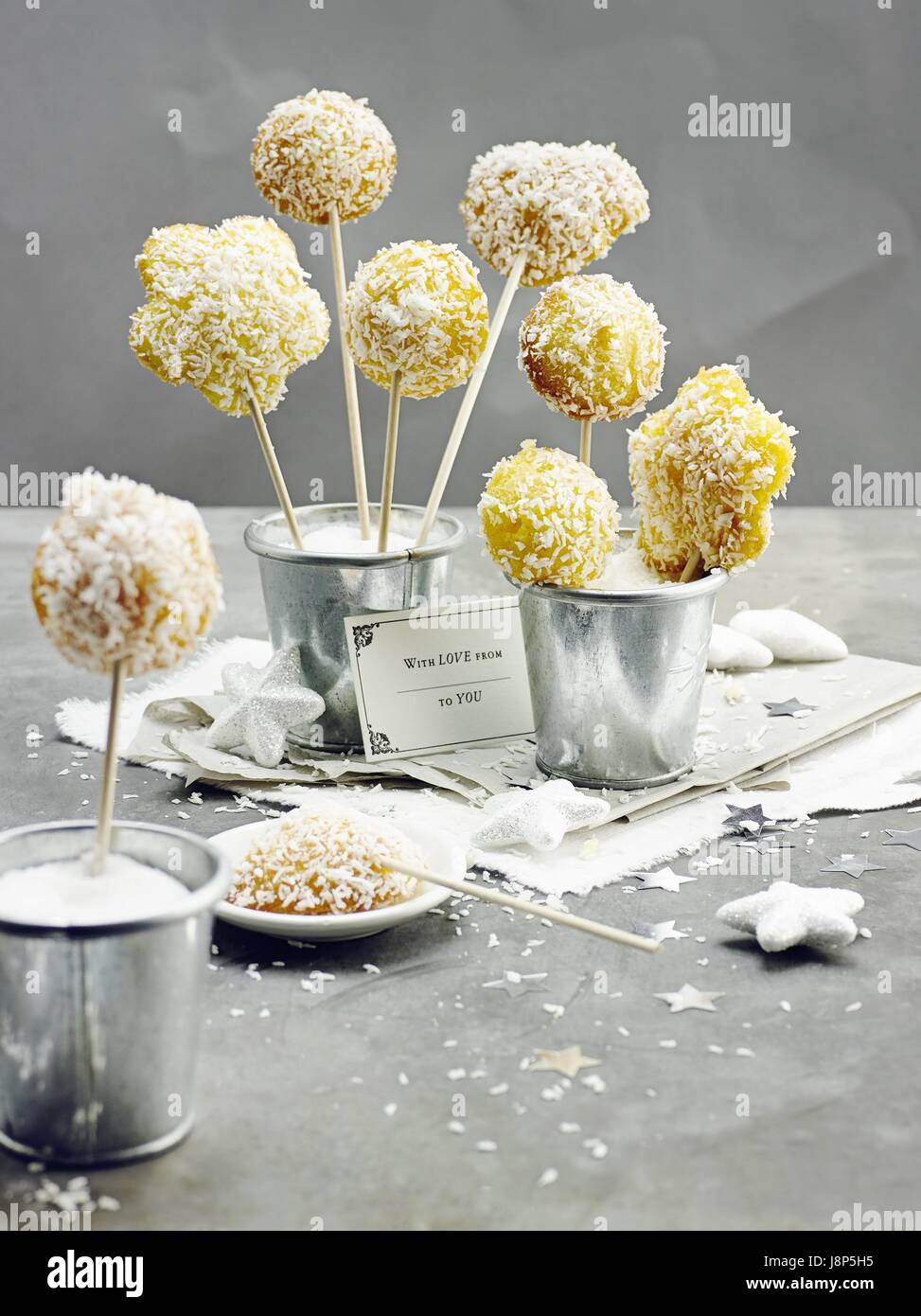 Orange coconut cake pops Stock Photo - Alamy