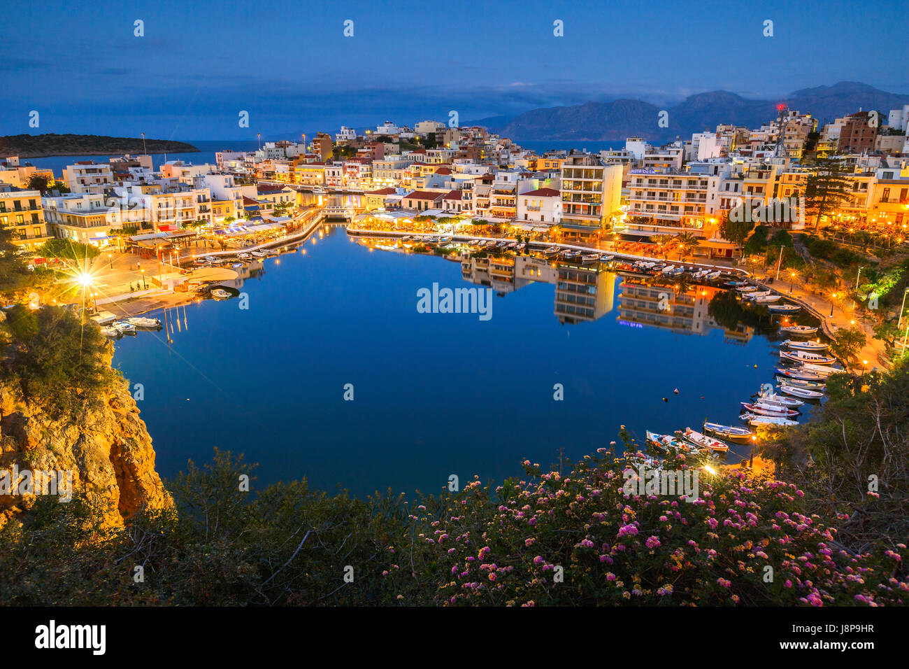View of Agios Nikolaos and its harbor, Crete, Greece Stock Photo - Alamy