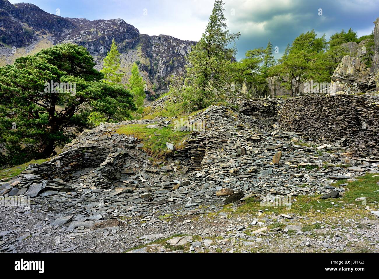 Slate spoil of Castle Crag Stock Photo - Alamy