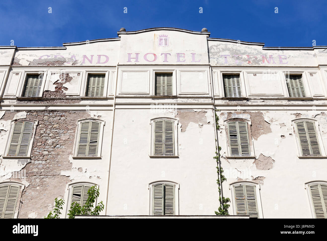 The facade of the abandoned Grand Hotel Terme, Salice Terme, Italy ...