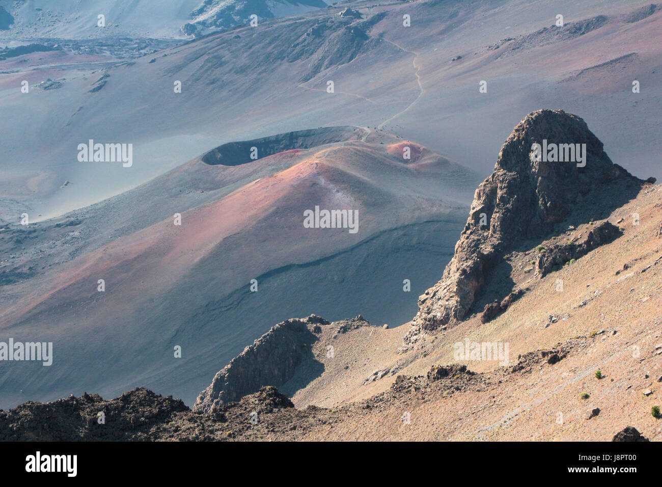 Cinder cone, old lava flows and ash dominate the summit caldera of the ...