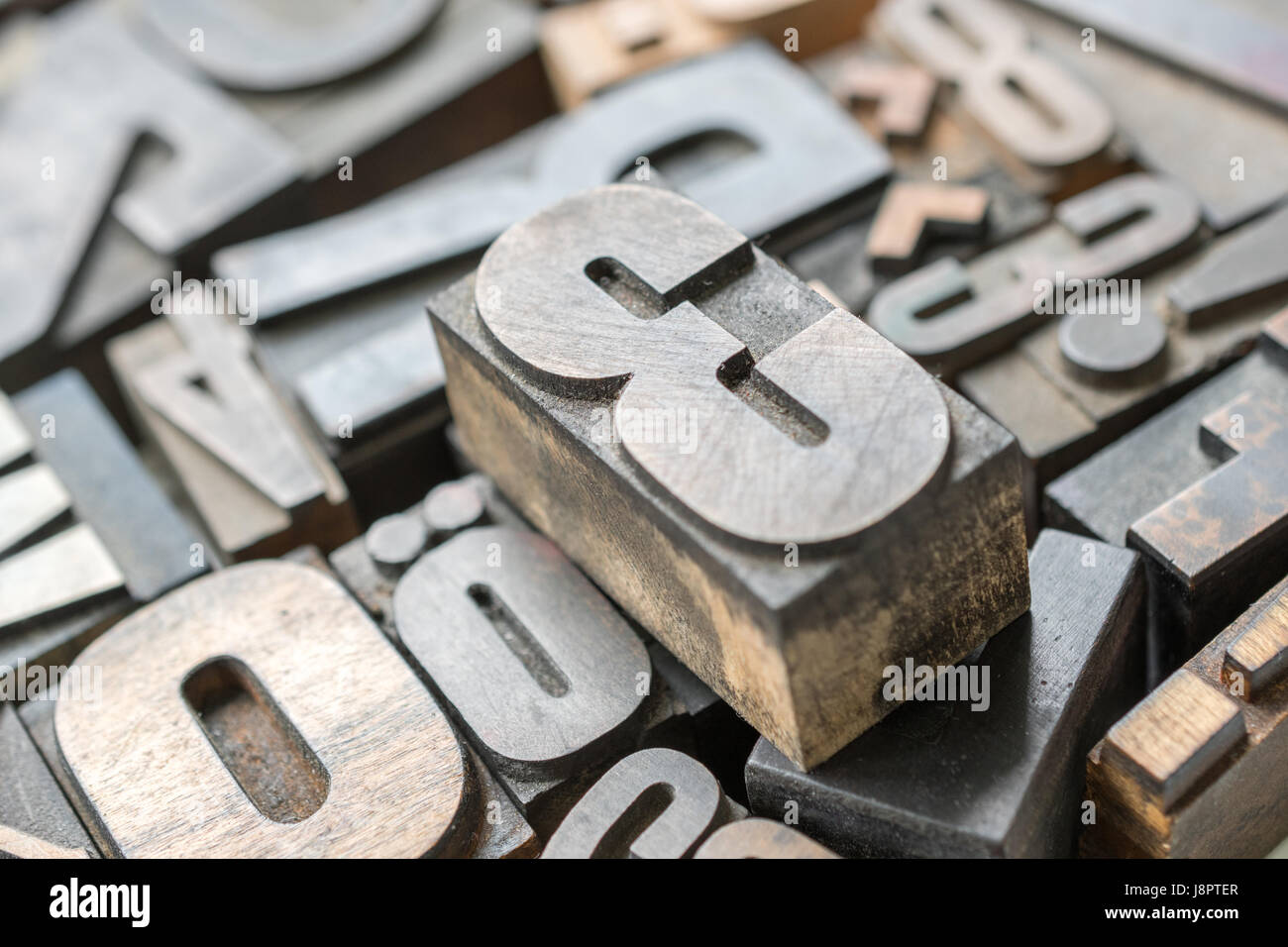 Old letterpress printing blocks on desk Stock Photo - Alamy