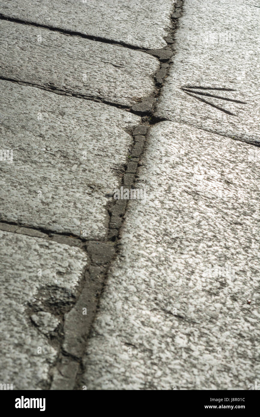 Traditional kerbside surveying benchmark reference point. Visual ...