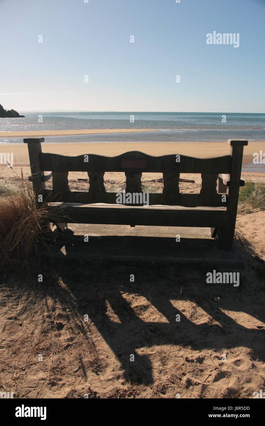 wooden bench on the beach with sea views Stock Photo - Alamy