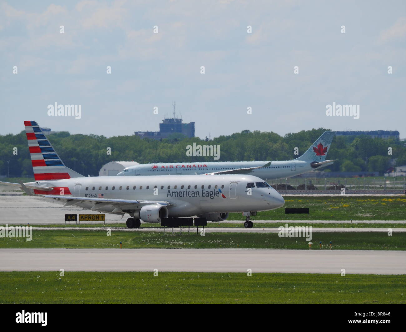 Passenger aircraft leaving airport runway hi-res stock photography and ...