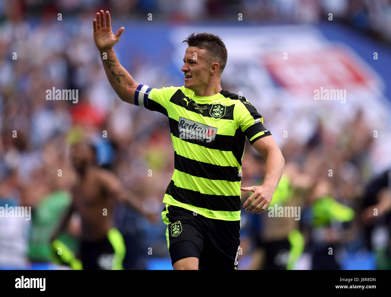 Huddersfield Town's Jonathan Hogg celebrates winning the penalty shoot ...