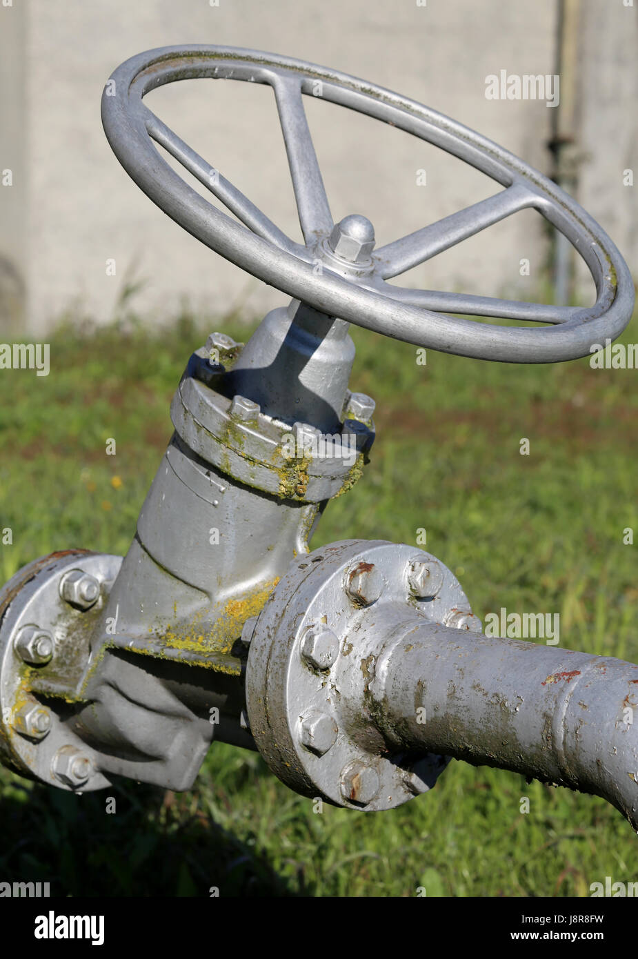 big tap with pipe closure valve in a large industrial plant Stock Photo ...